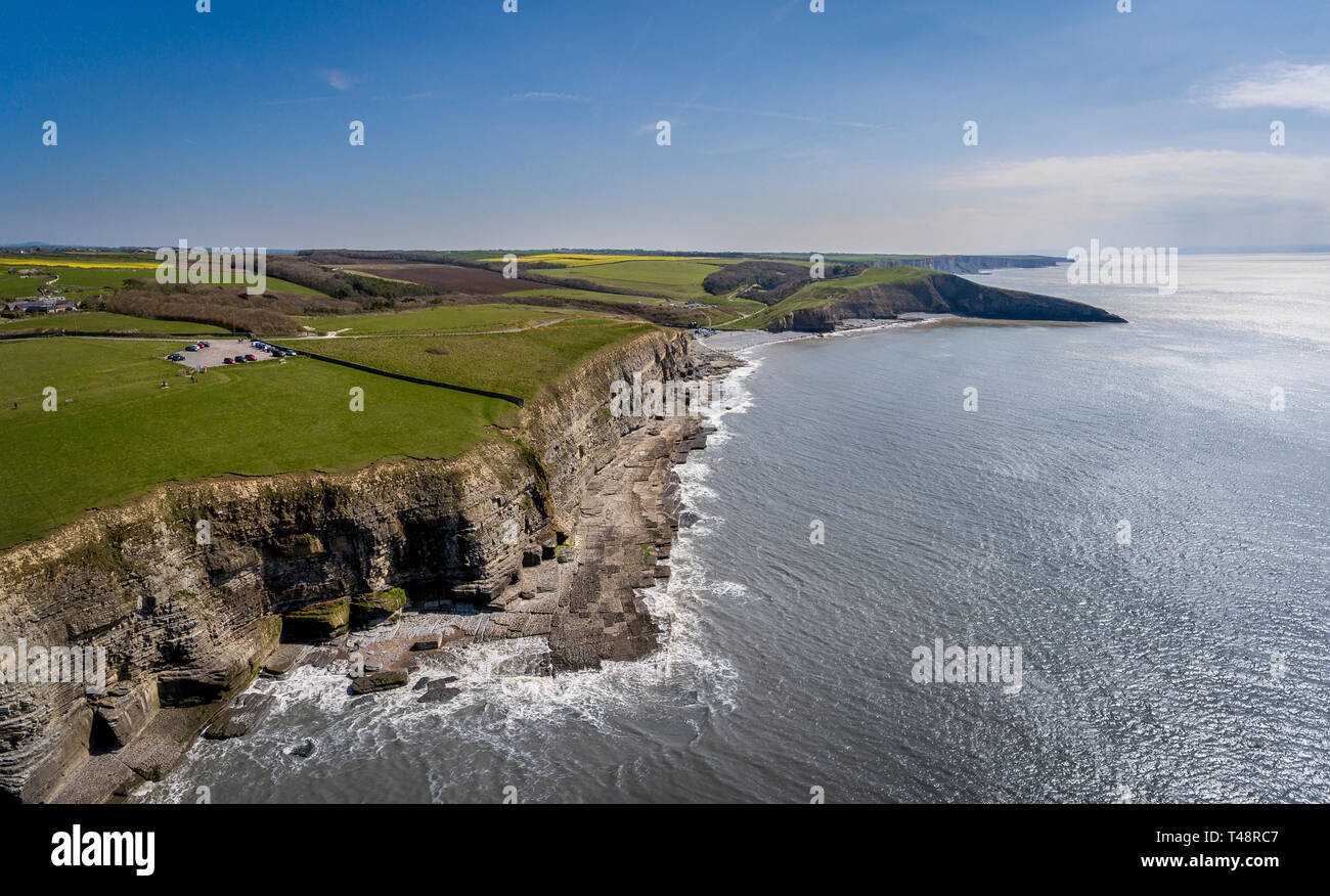 An aerial view of The beach and cliffs at Dunraven bay at Southerndown ...