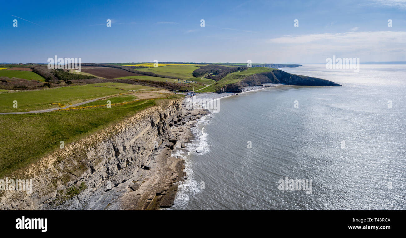 An aerial view of The beach and cliffs at Dunraven bay at Southerndown ...
