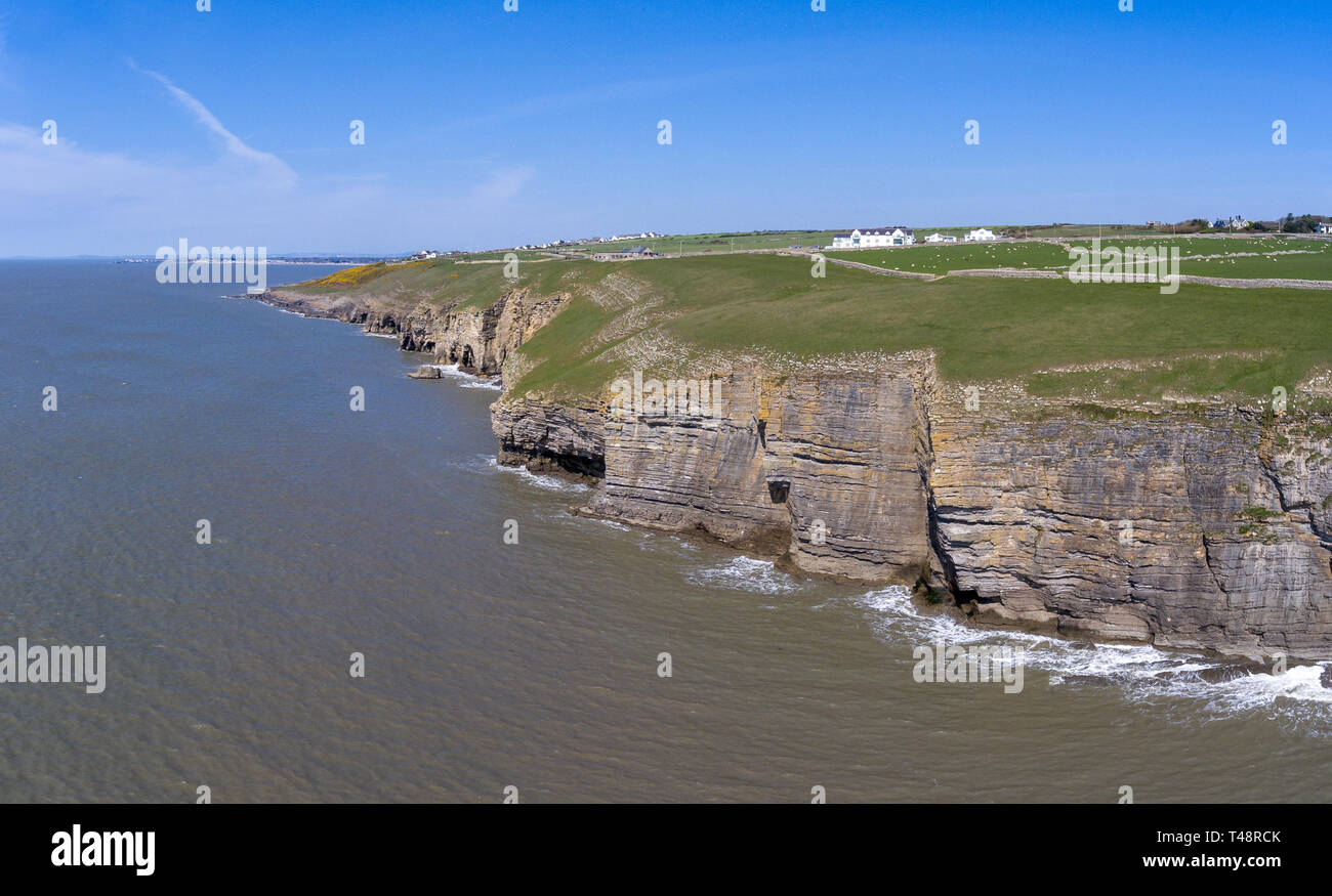 An aerial view of The beach and cliffs at Dunraven bay at Southerndown ...