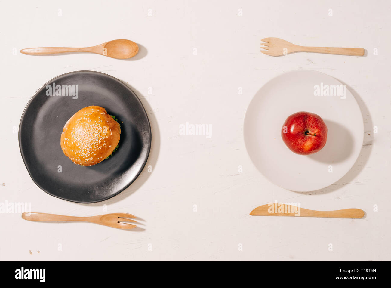 Choice dilemma between healthy good fresh fruit and vegetables or ...