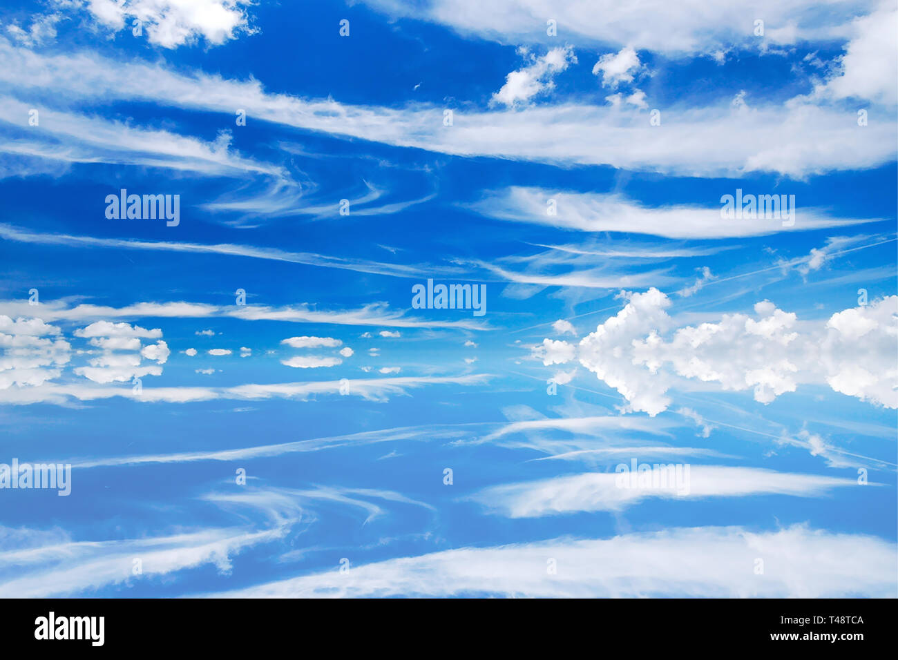 beautiful sky clouds reflect in water natural Stock Photo - Alamy