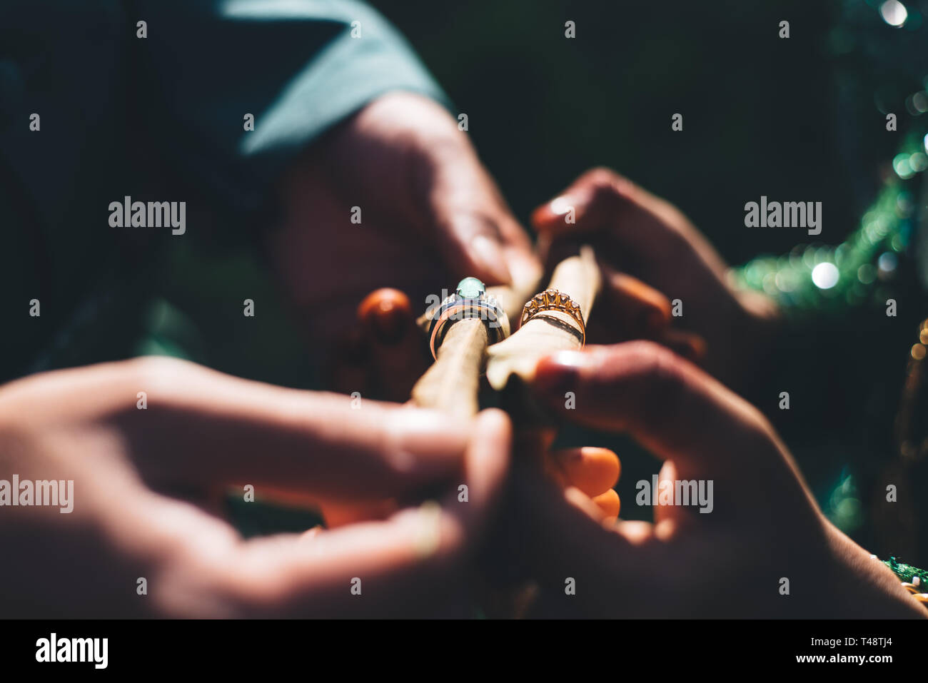 Married couple with traditional wedding dress showing their wedding ...