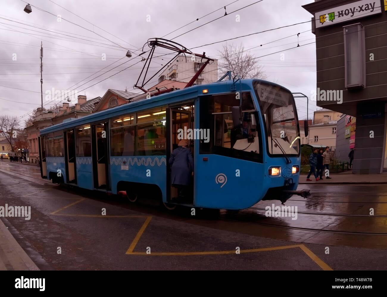 At the tram stop Stock Photo - Alamy