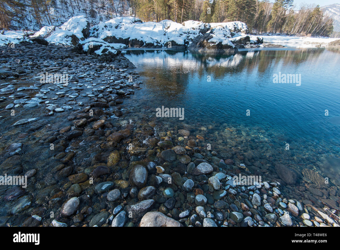 Crystal pure water of blue lake Stock Photo - Alamy