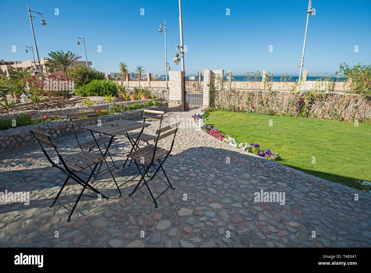 Luxury villa show home exterior garden view in a tropical resort with ...