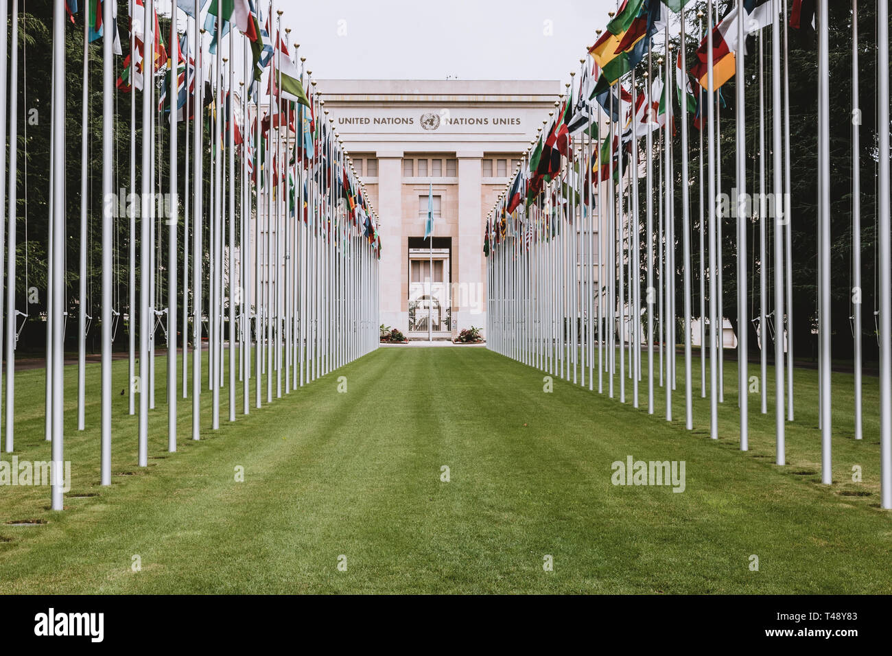Geneva, Switzerland - July 1, 2017: National flags at the entrance in ...