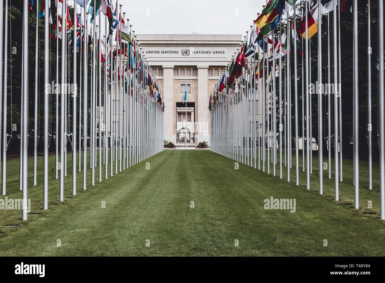 Geneva, Switzerland - July 1, 2017: National flags at the entrance in ...