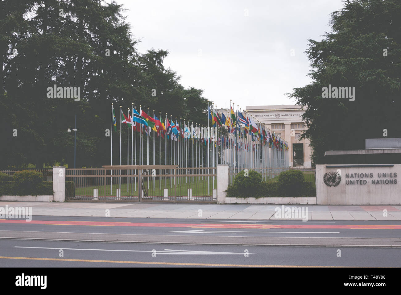 Geneva, Switzerland - July 1, 2017: National flags at the entrance in ...