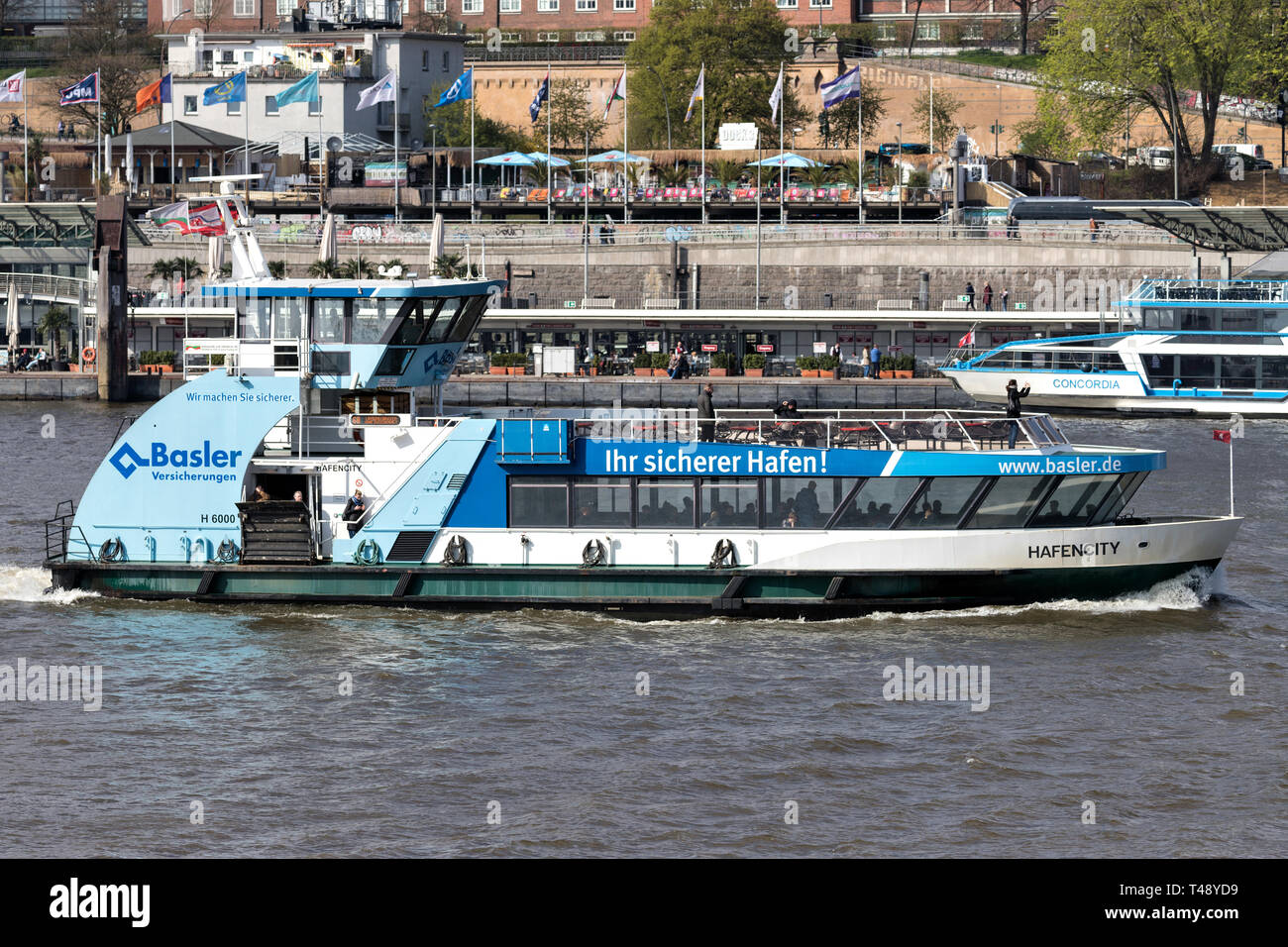 Typical flat-iron-shaped HADAG ferry HAFENCITY in front of the St ...