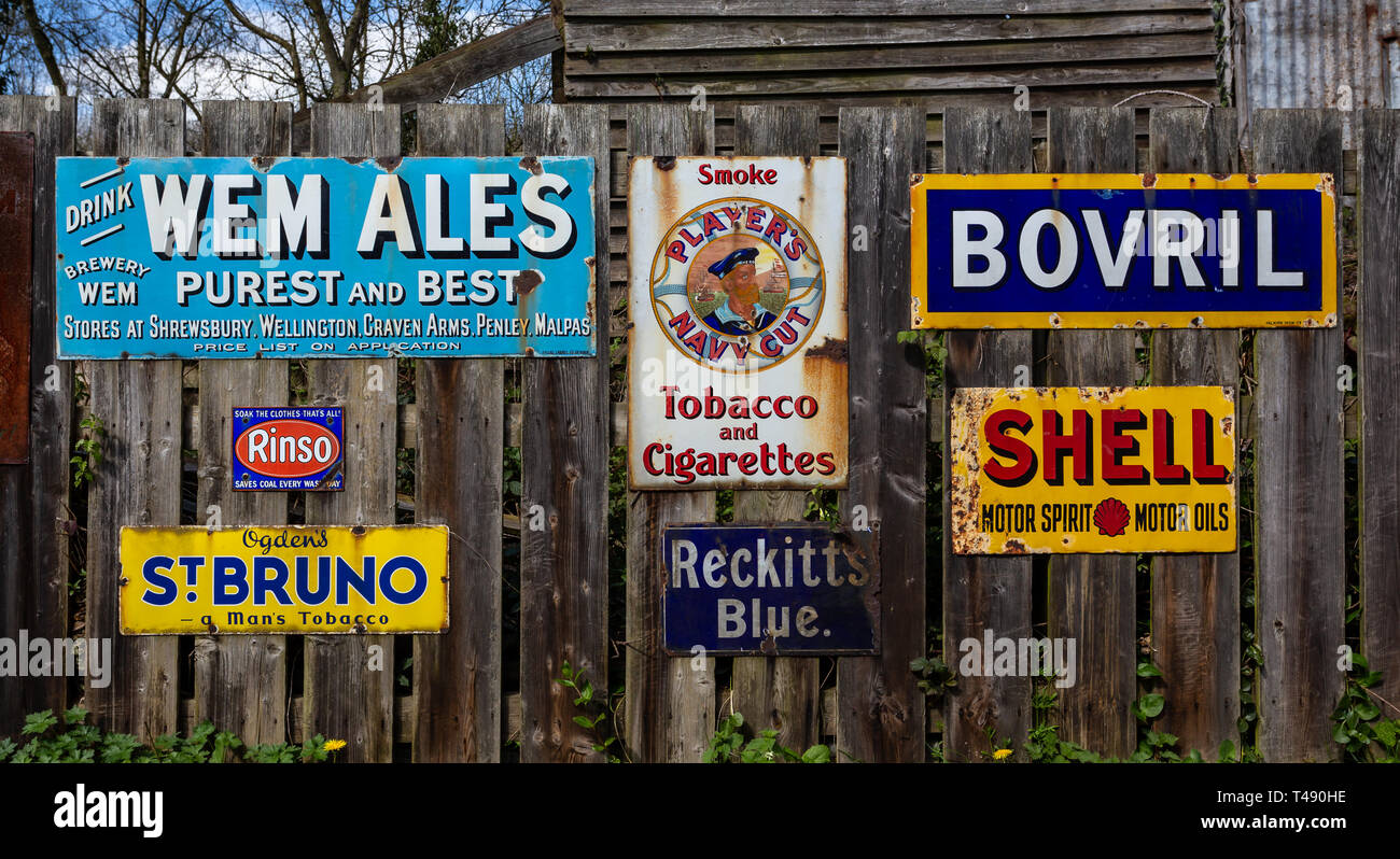 Collection of antique Victorian metal product advertising signs in ...