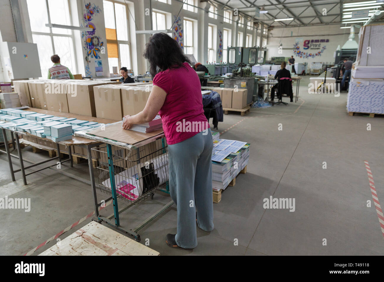 KIEV, UKRAINE - MARCH 28, 2018: Workers work in Gamma Print typography ...