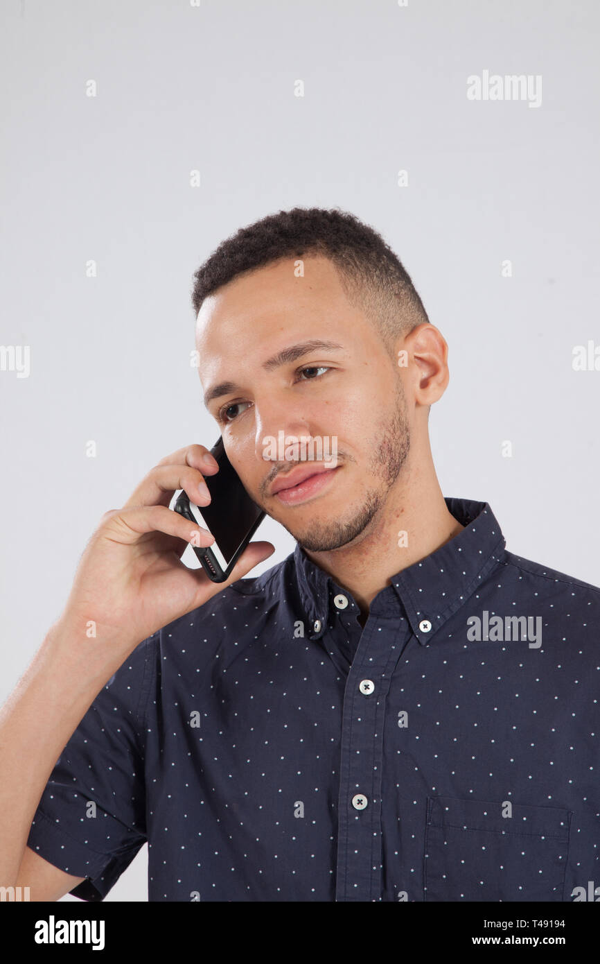 Handsome young man talking hi-res stock photography and images - Alamy