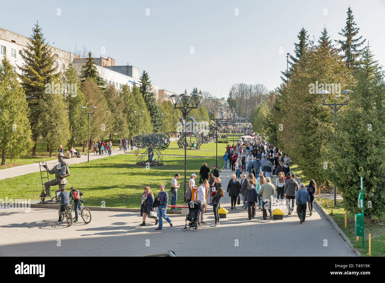 ROVNO, UKRAINE - APRIL 09, 2018: Unrecognized people walk in the Swan ...