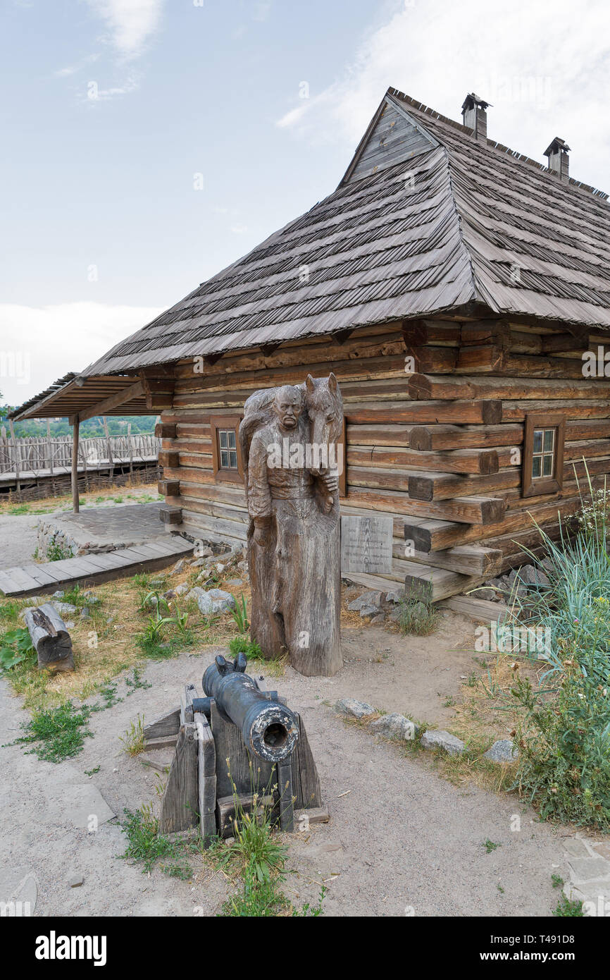 KHORTYTSIA, UKRAINE - JULY 03, 2018: Wooden statue of famous Ukrainian ...
