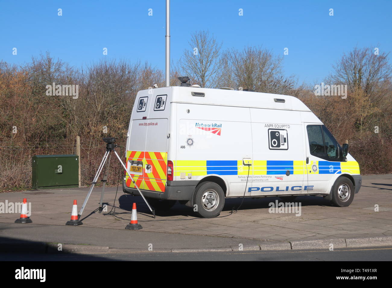 A REAR VIEW OF A POLICE FORD TRANSIT RAIL SAFETY VAN SET UP AT A LEVEL ...