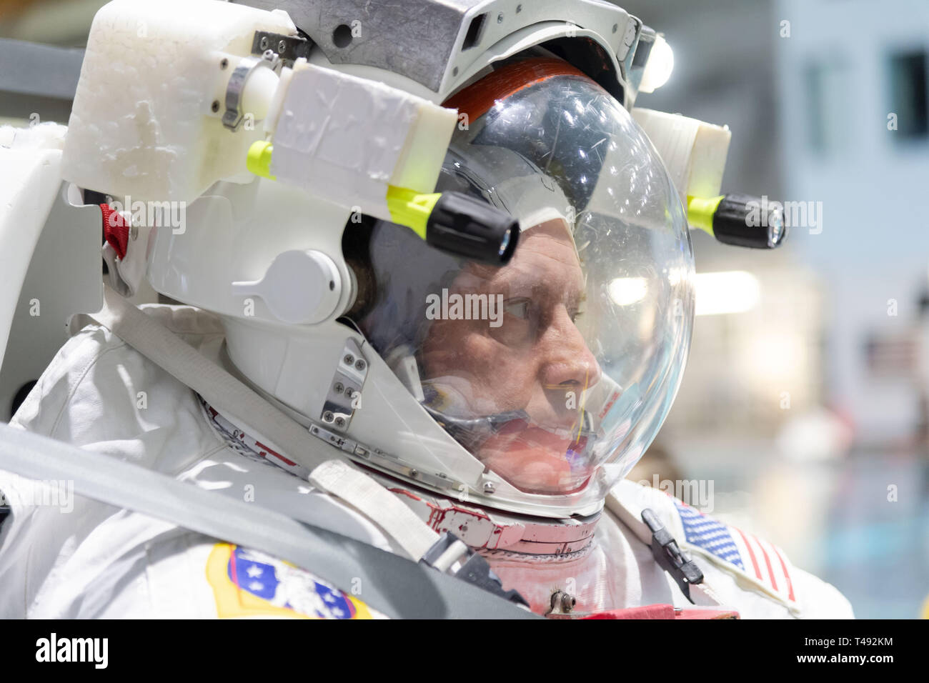 Commercial Crew Program astronaut Mike Fincke, in his spacesuit before ...