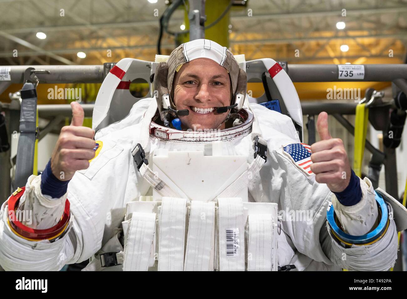Boeing Commercial Crew Program astronaut Josh Cassada gives a thumbs up ...