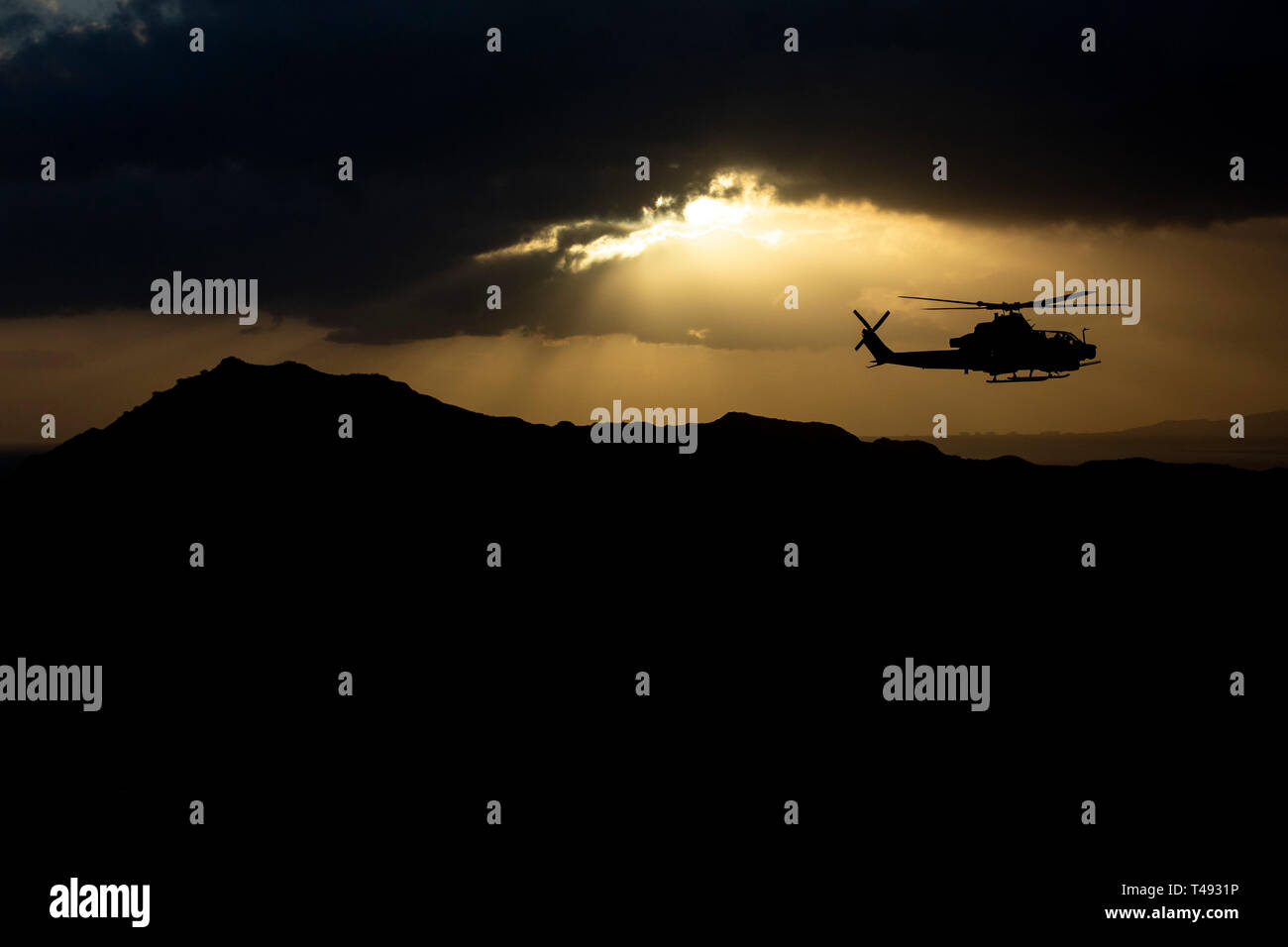 A U.S. Marine Corps AH-1Z Viper attack helicopter with Marine Light ...