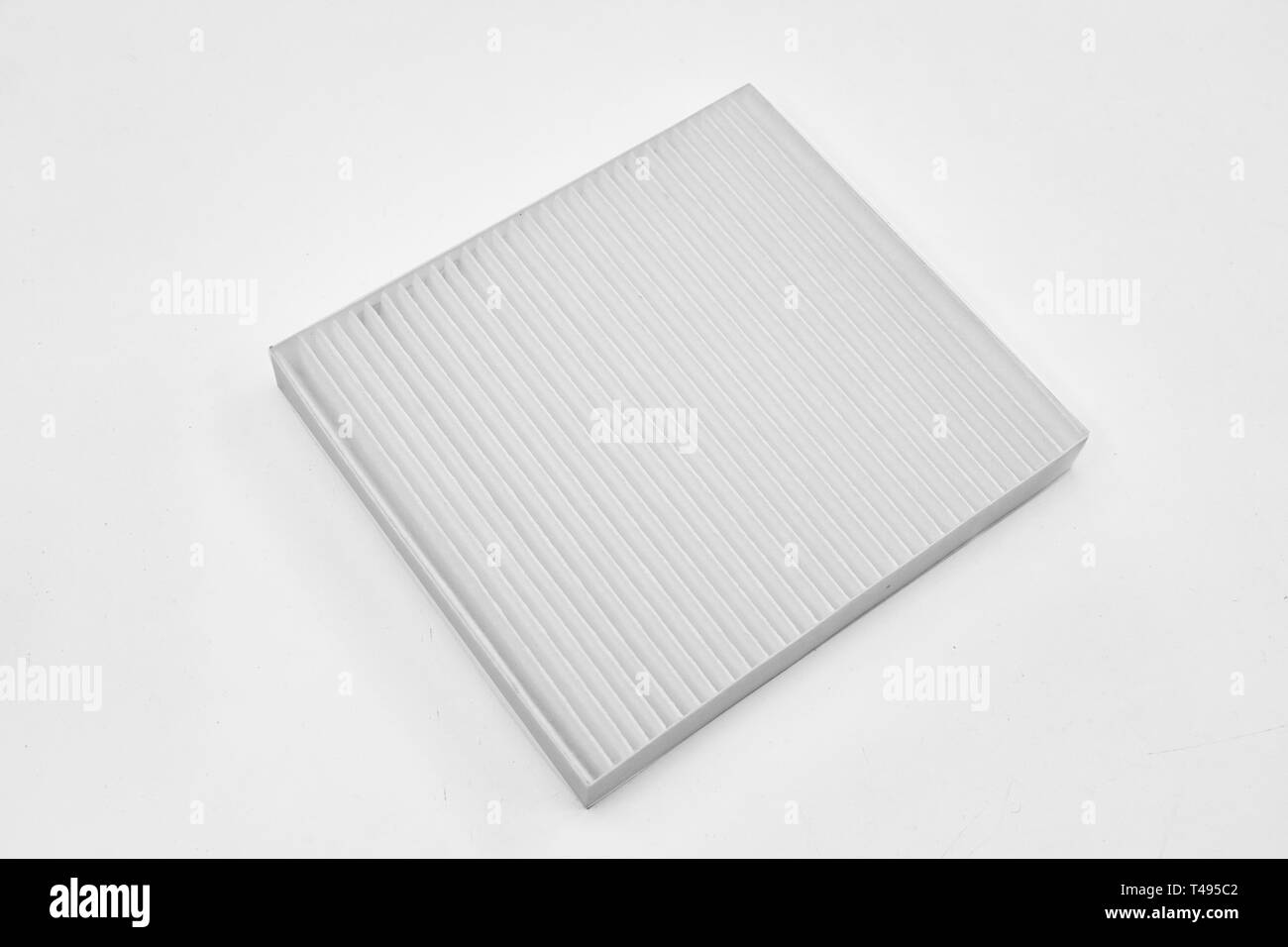 Close-up on a car filter for a white engine as a background with ...