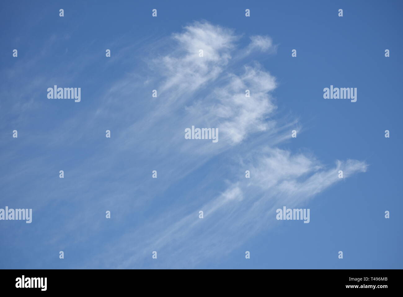 Wispy clouds with tails Stock Photo - Alamy