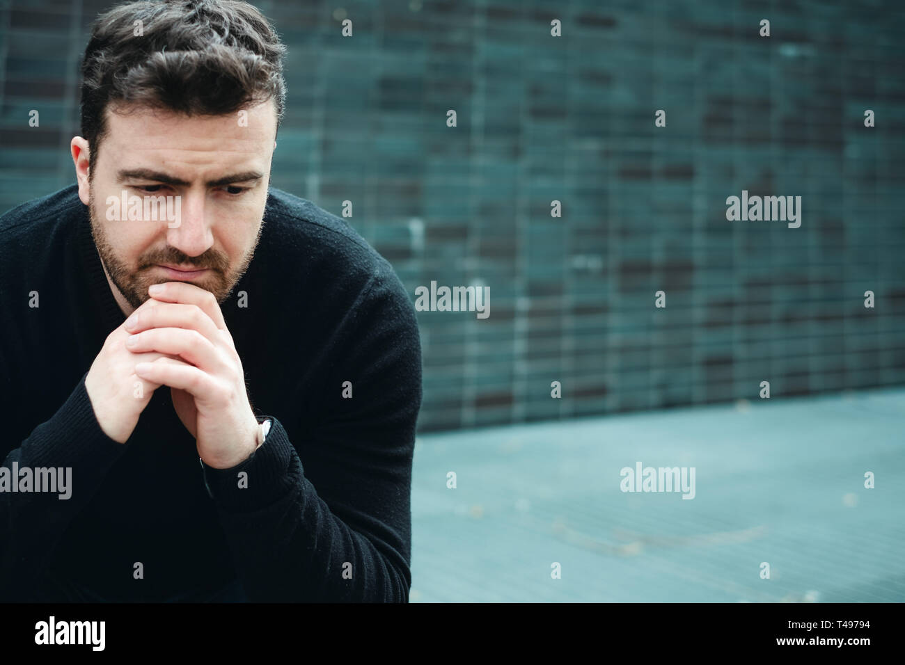 Desperate man lost in depression suffering emotional pain Stock Photo ...