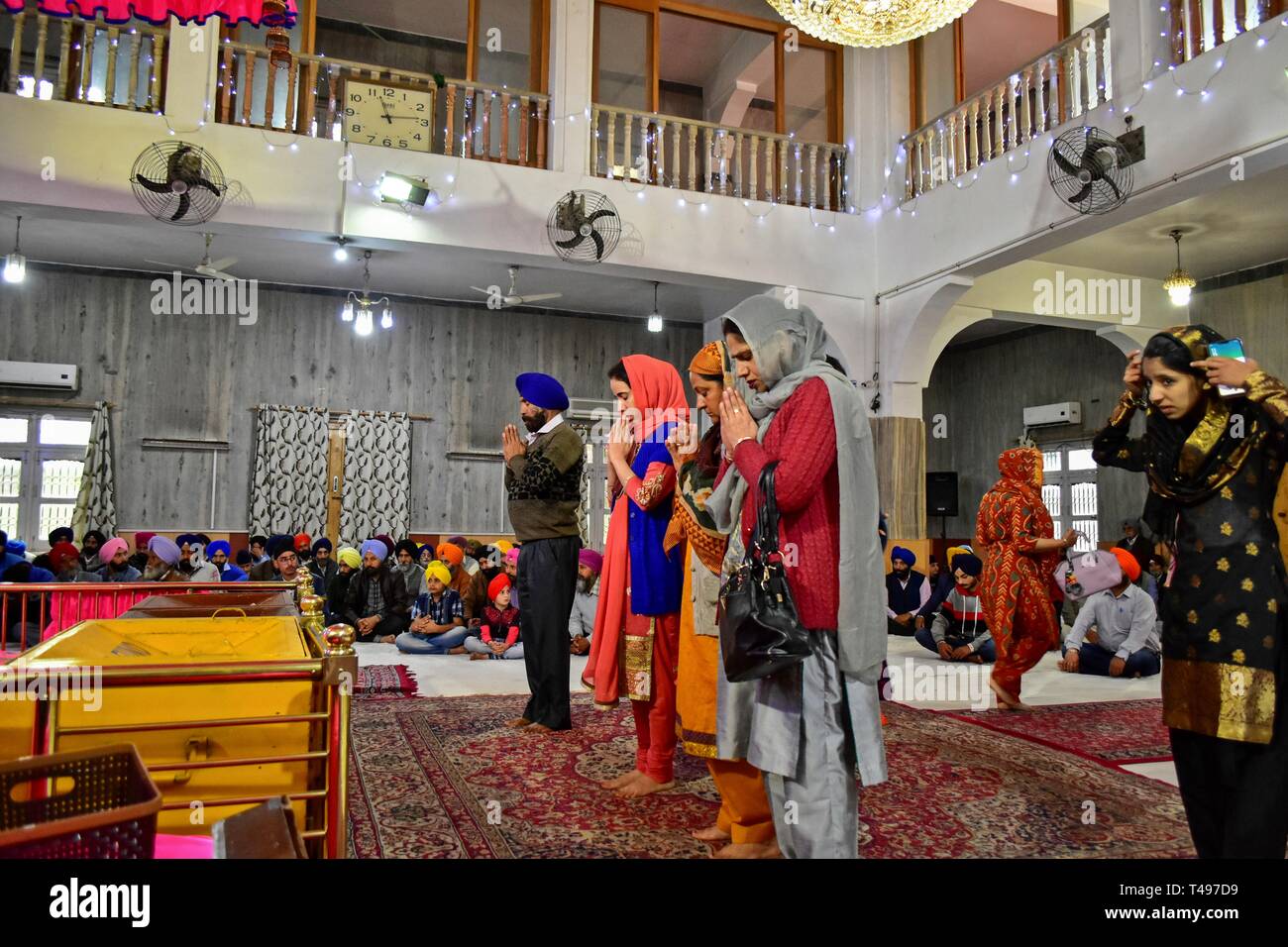 Sikhs Praying In Gurdwara
