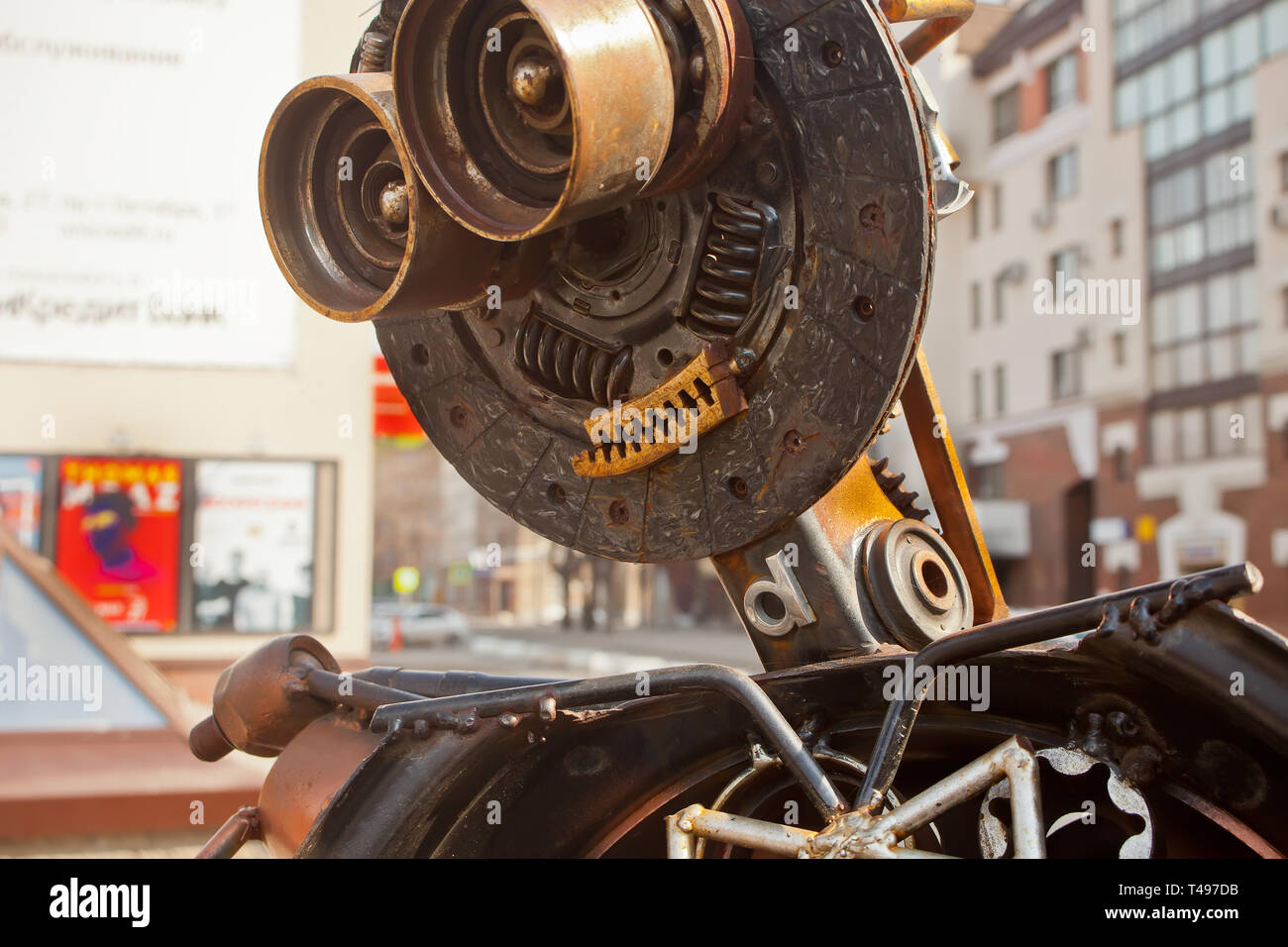 Metal sculpture of trash compactor robot made of rusty details of old ...