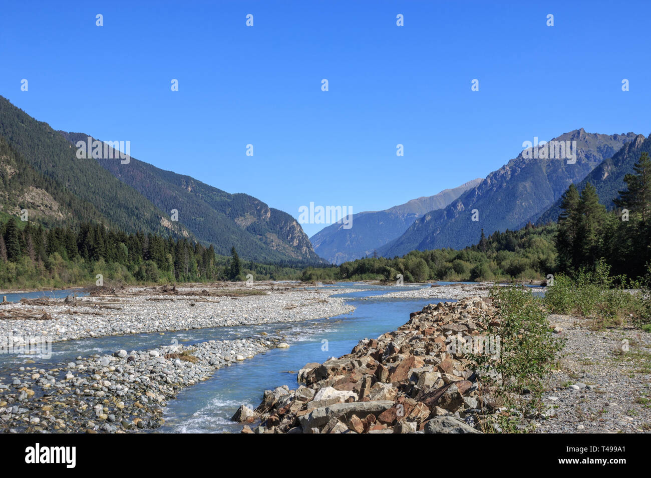 Panorama view of river scene in mountains of national park Dombay ...