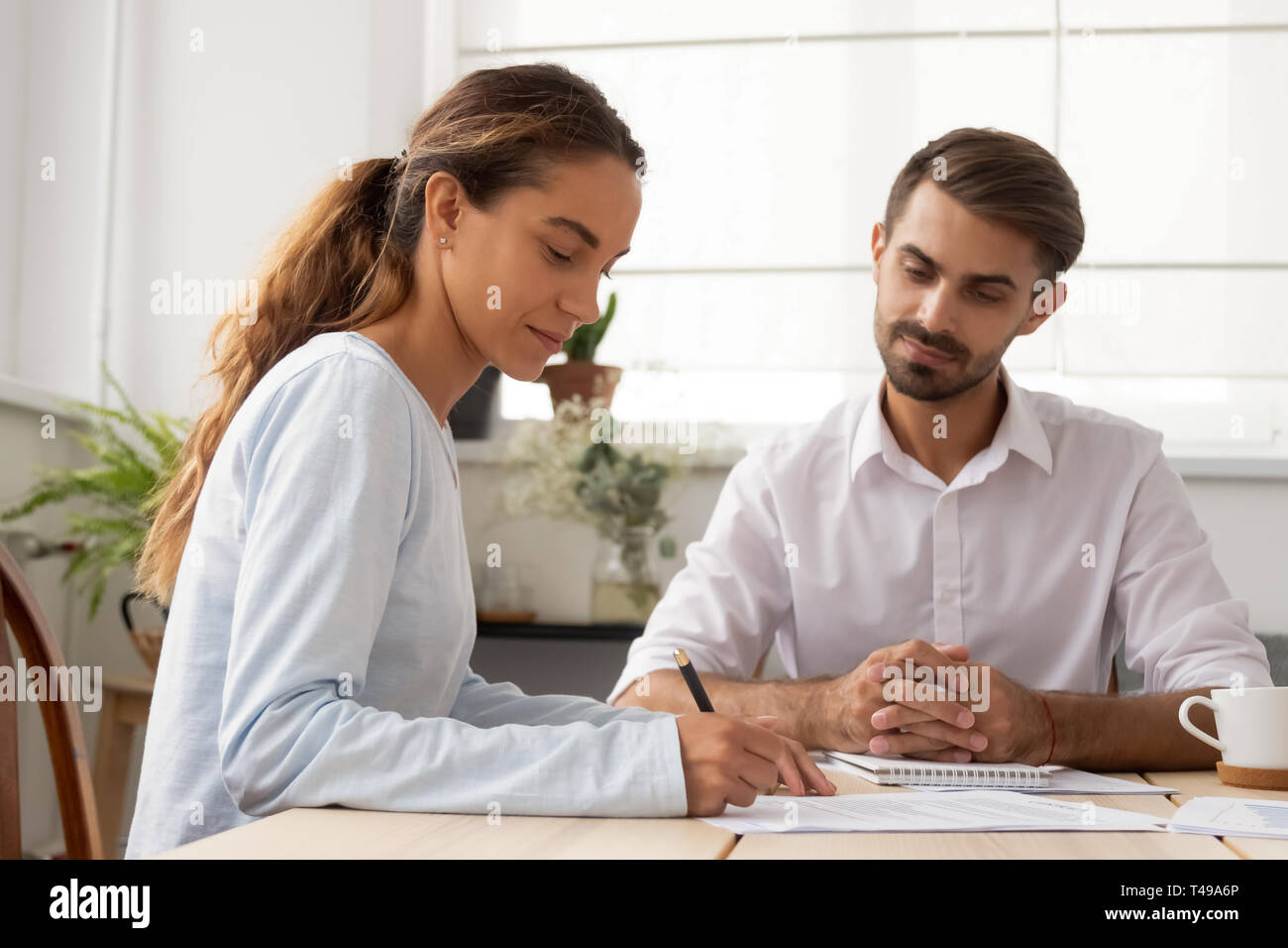 Female client sign insurance contract meeting broker lawyer making deal ...