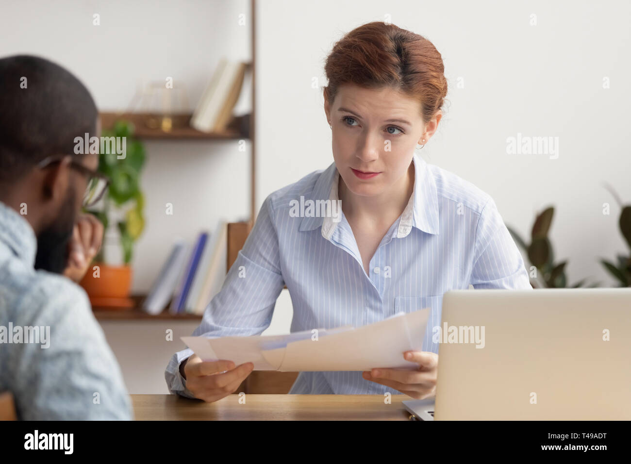 Angry boss dissatisfied with report demand explanation from incompetent ...