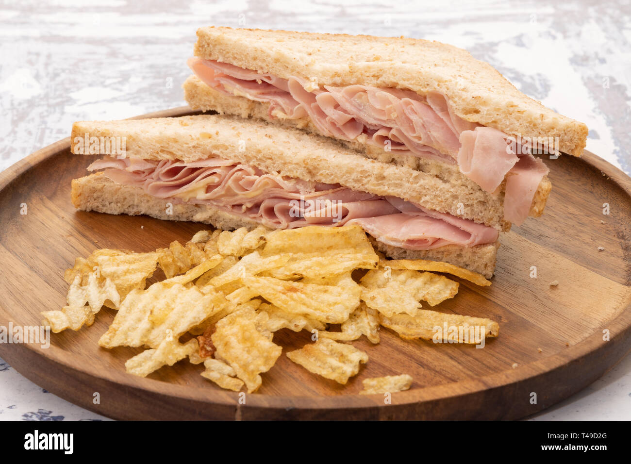 Ham sandwich with potato crisps Stock Photo - Alamy