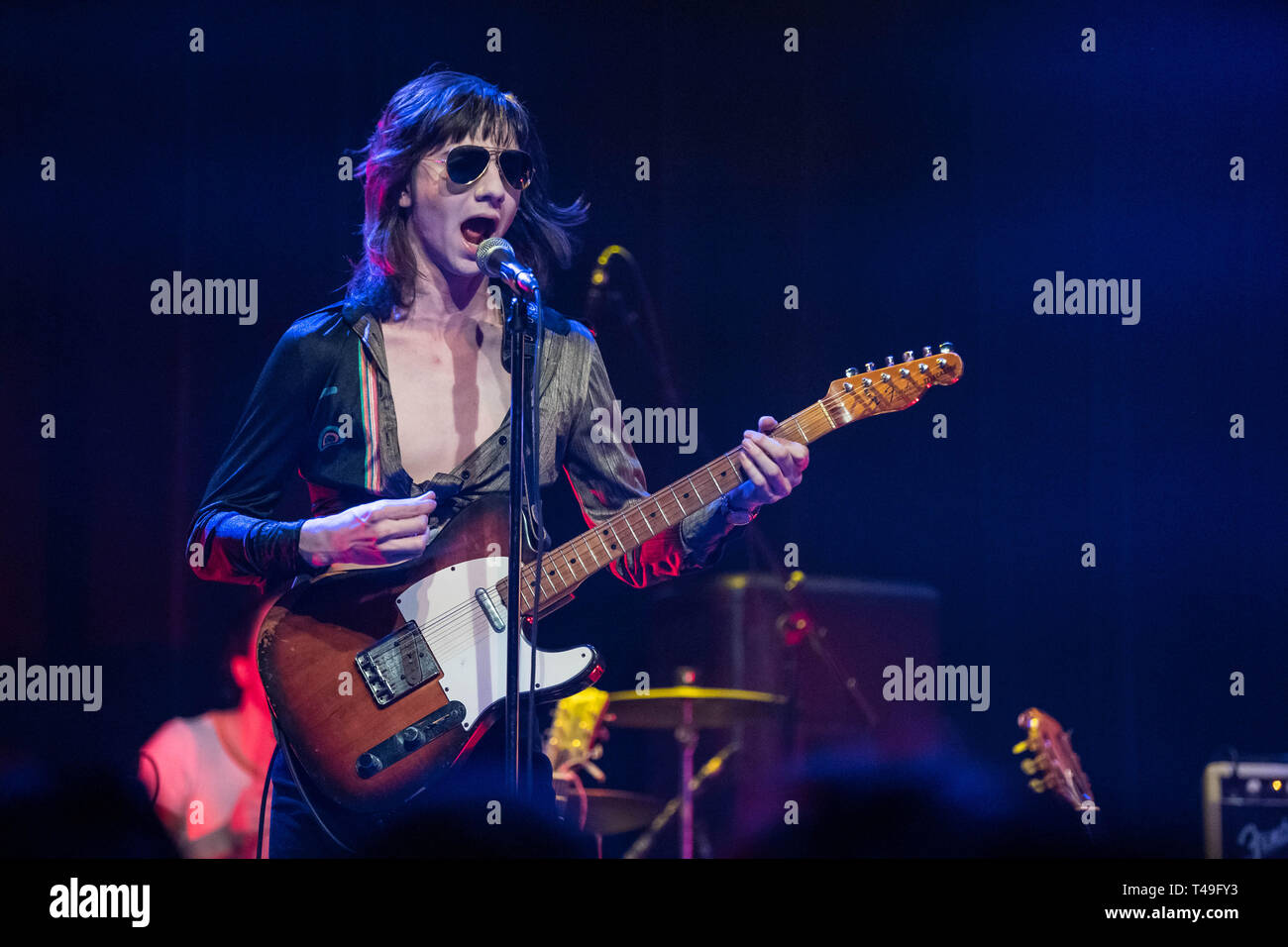 Rock singer long hair hi-res stock photography and images - Alamy