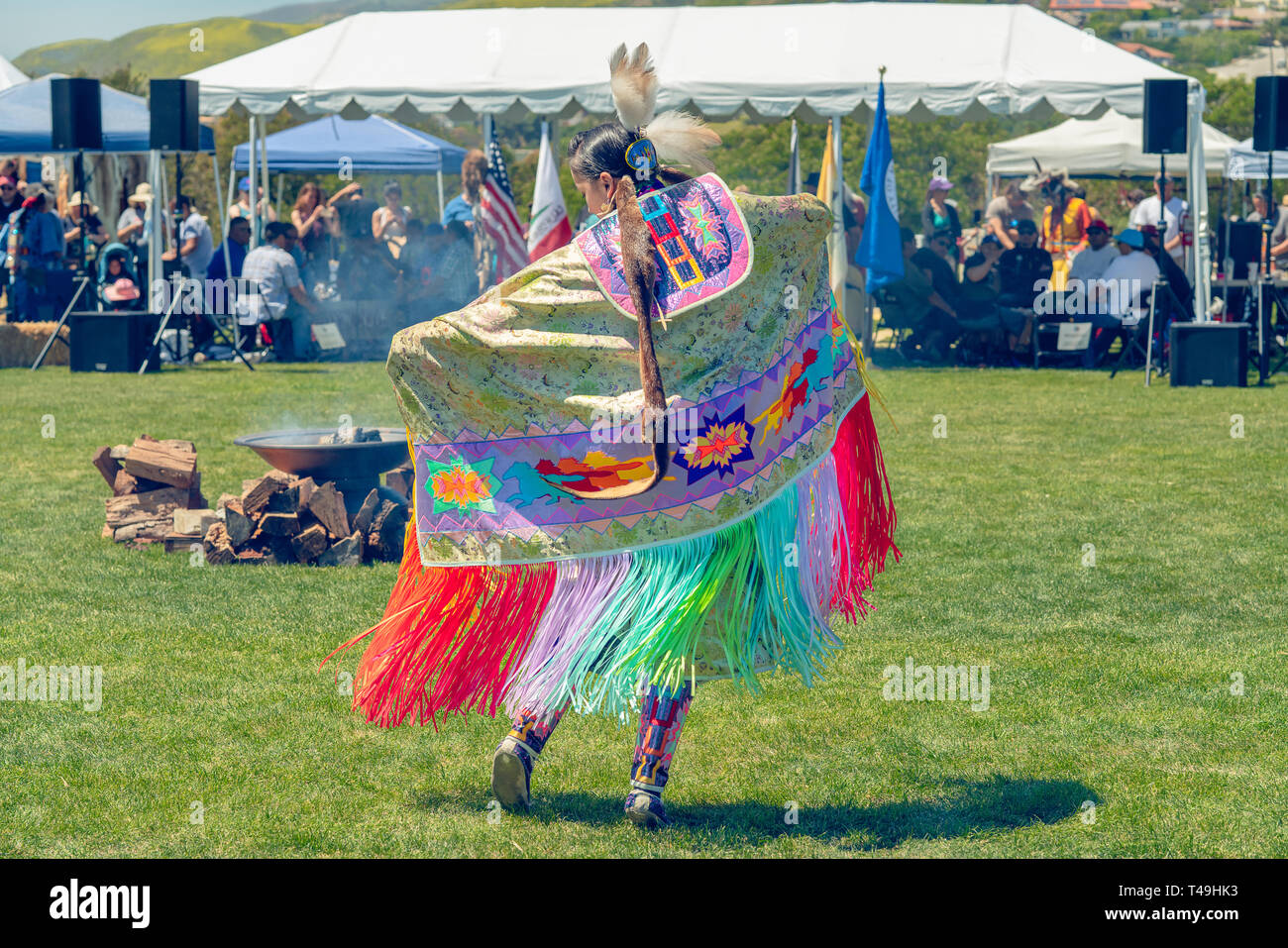 A Native American female dancer dancing at annual pow-wow at Malibu, CA ...