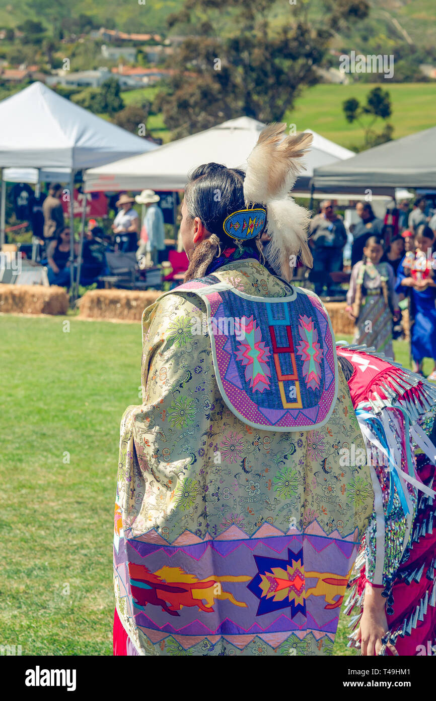 A Native American female dancer dancing at annual pow-wow at Malibu, CA ...