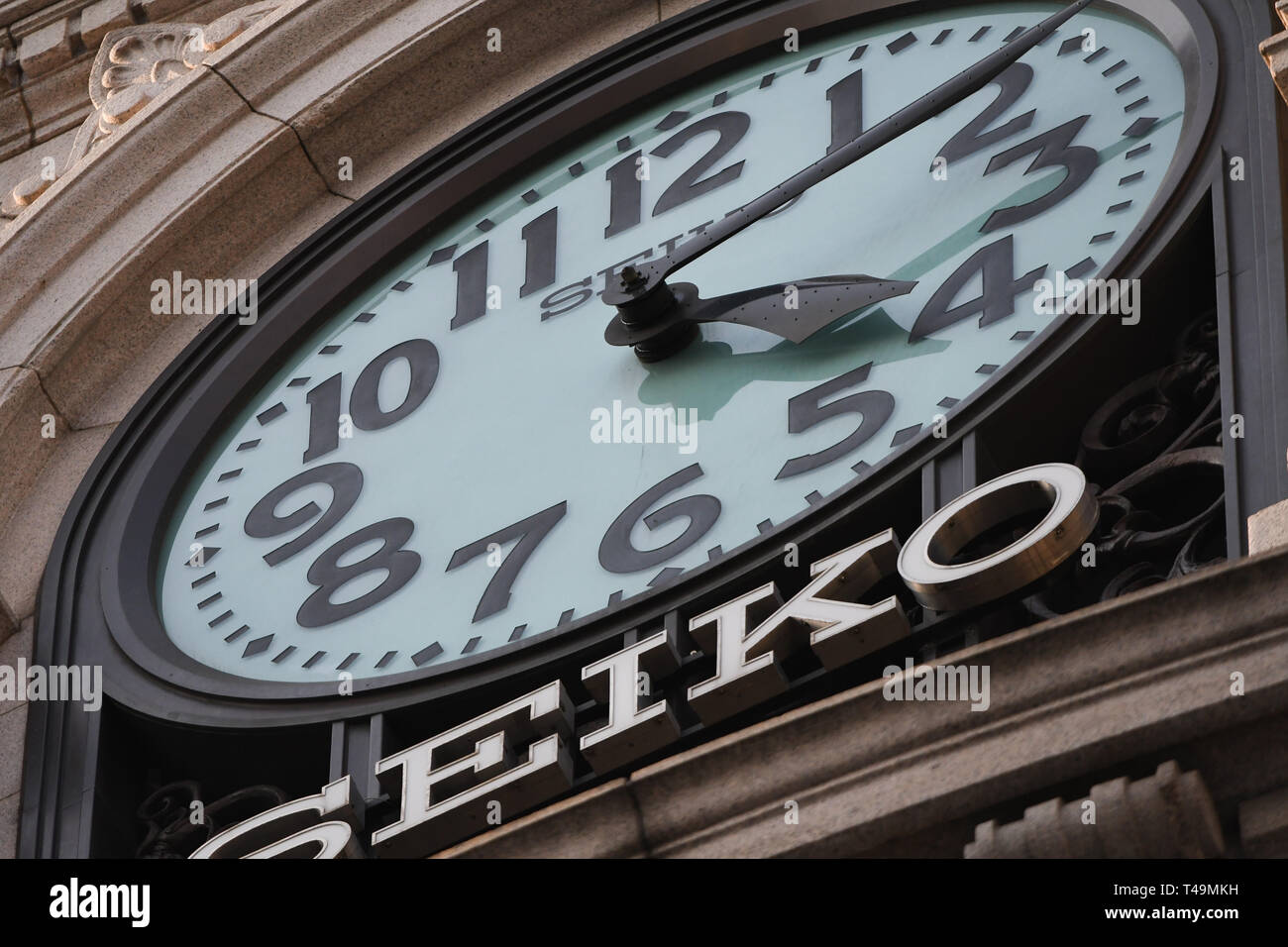 Tokyo, Japan. 6th Apr, 2019. The tower clock hungs at top of the Seiko ...