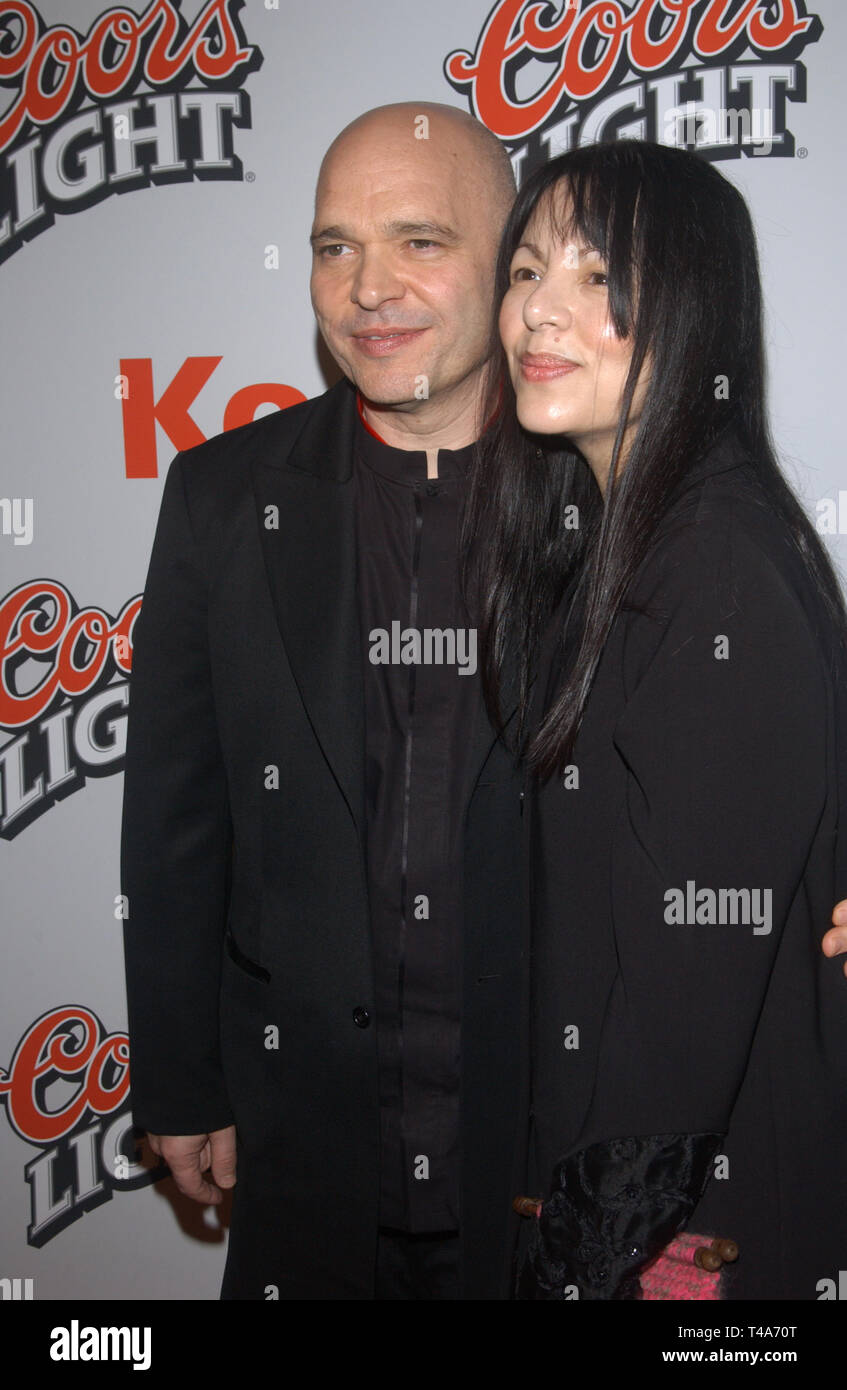 LOS ANGELES, CA. December 07, 2003: Director ANTHONY MINGHELLA & wife ...