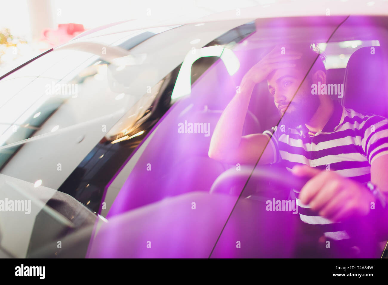 First test drive. Handsome young man ready to make first test drive ...