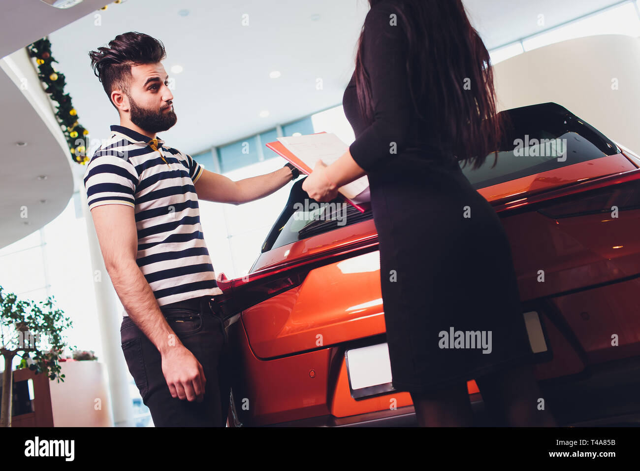 First test drive. Handsome young man ready to make first test drive ...