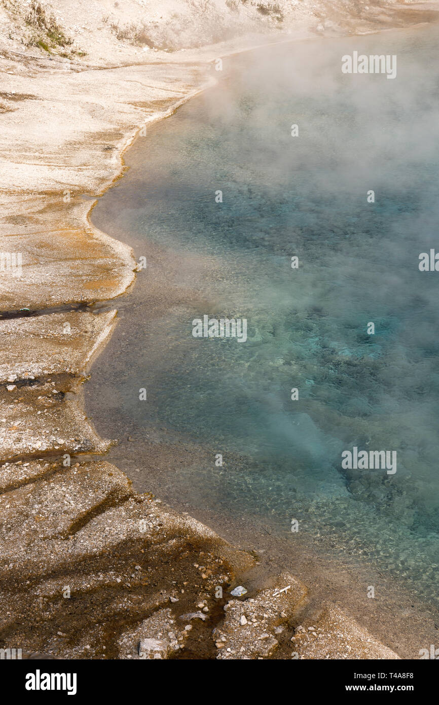 Geyser in grand prismatic spring Basin in Yellowstone National Park in ...
