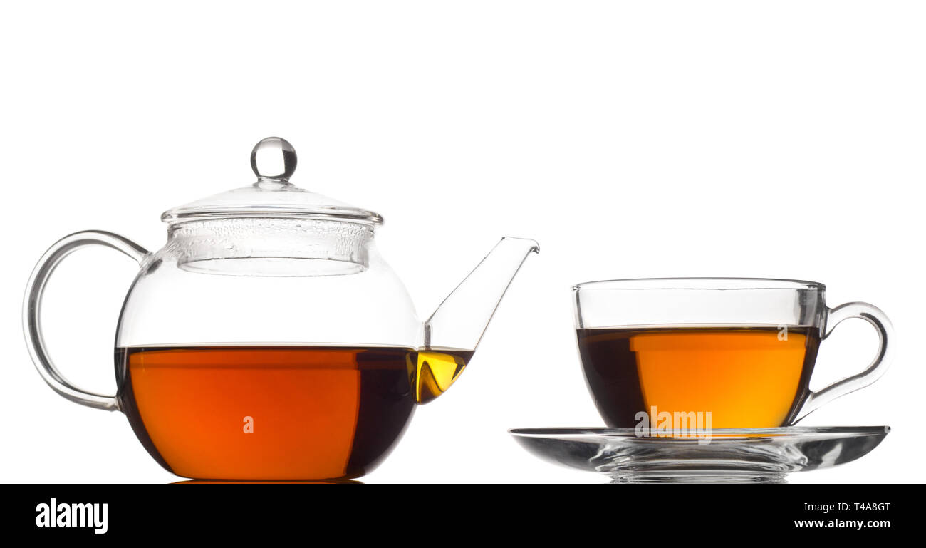 tea pot with tea and cup Stock Photo - Alamy