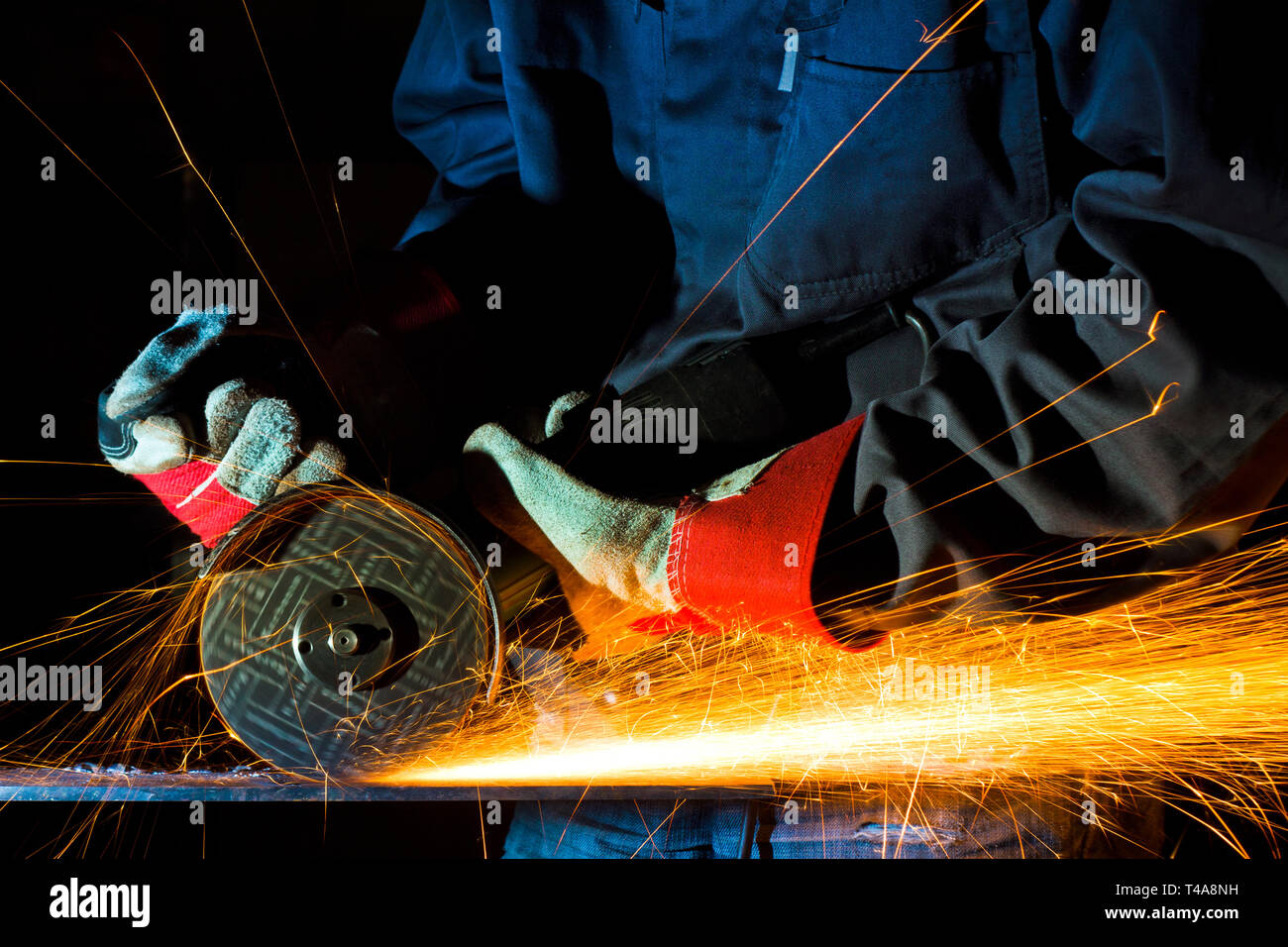 sparks while grinding iron Stock Photo - Alamy
