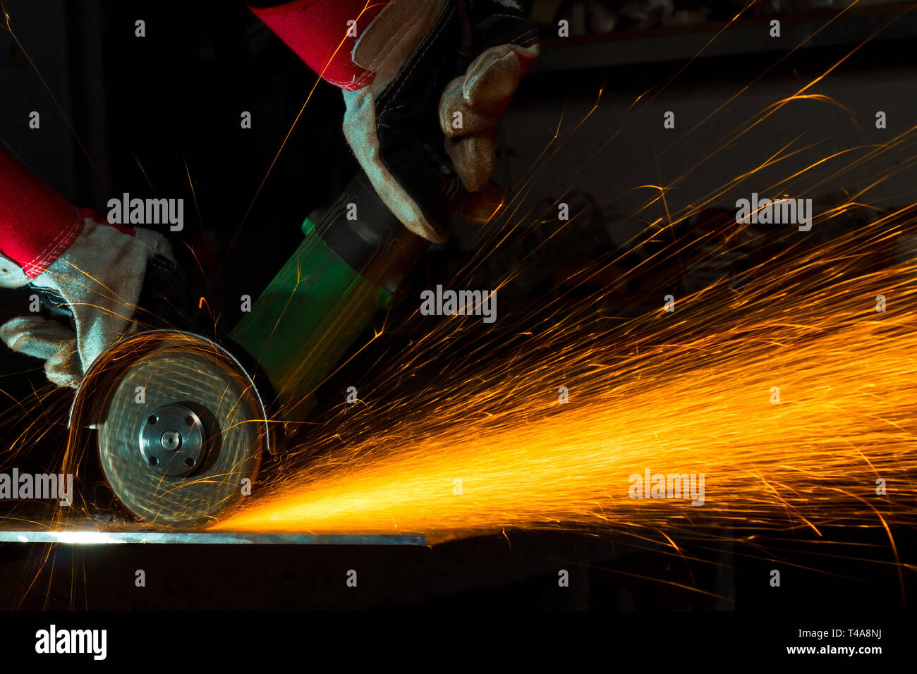 sparks while grinding iron Stock Photo - Alamy