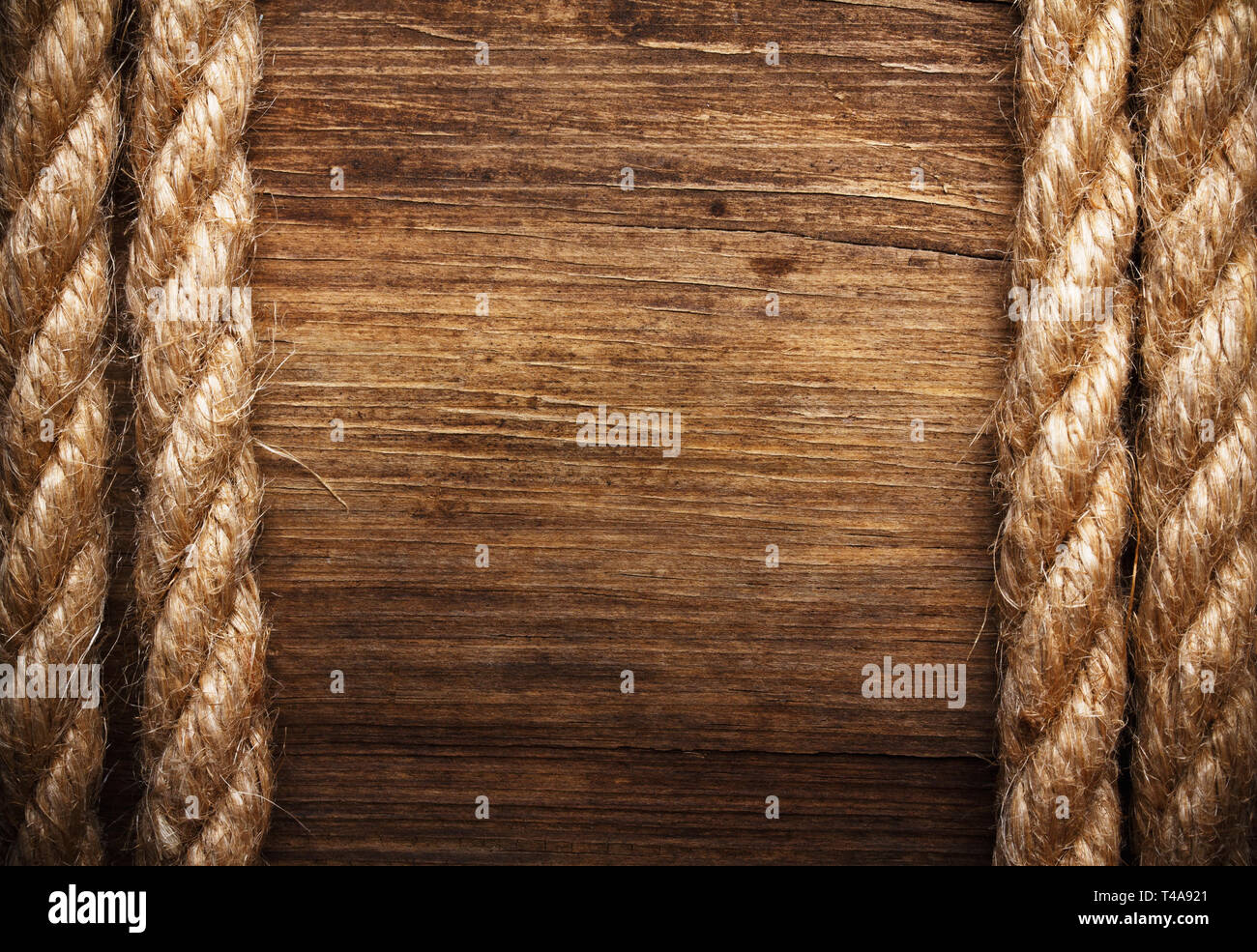 rope on weathered wood background Stock Photo - Alamy