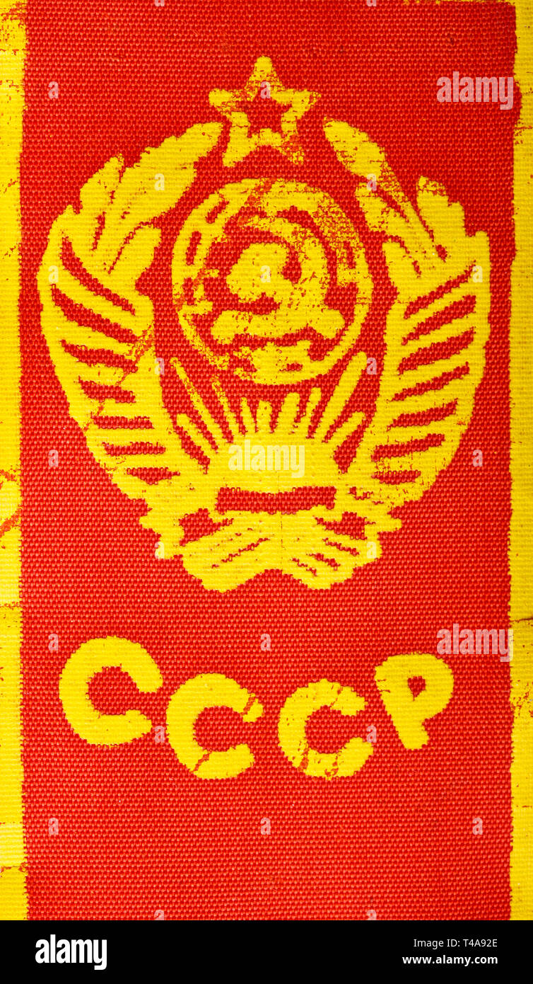 Vintage USSR state emblem on printed on red fabric Stock Photo - Alamy