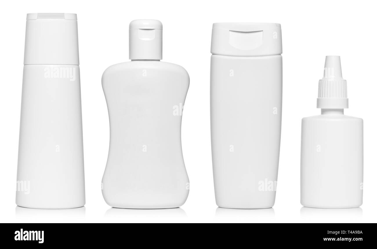 White bottles isolated on white Stock Photo - Alamy