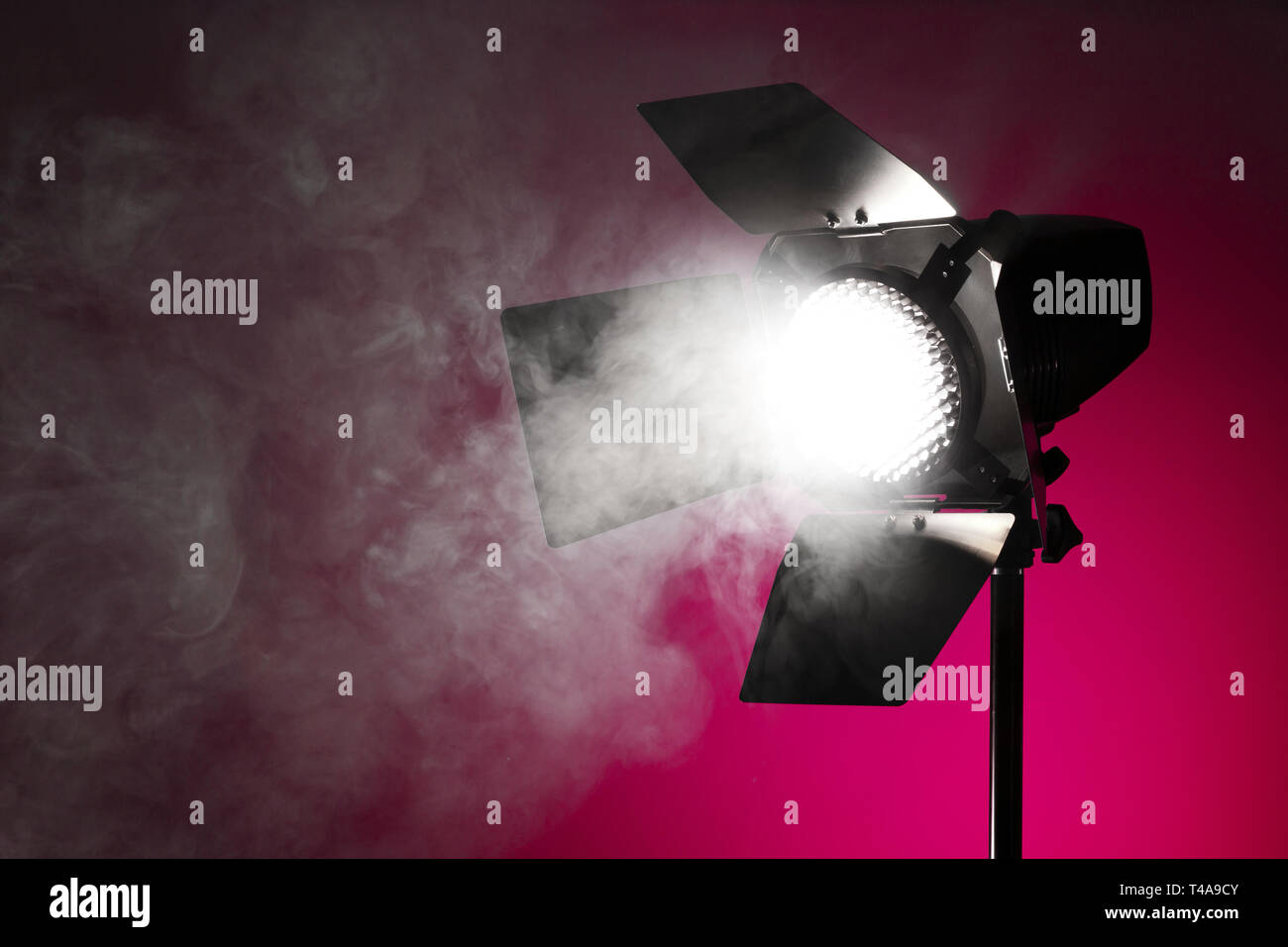Studio spot light with smoke Stock Photo - Alamy