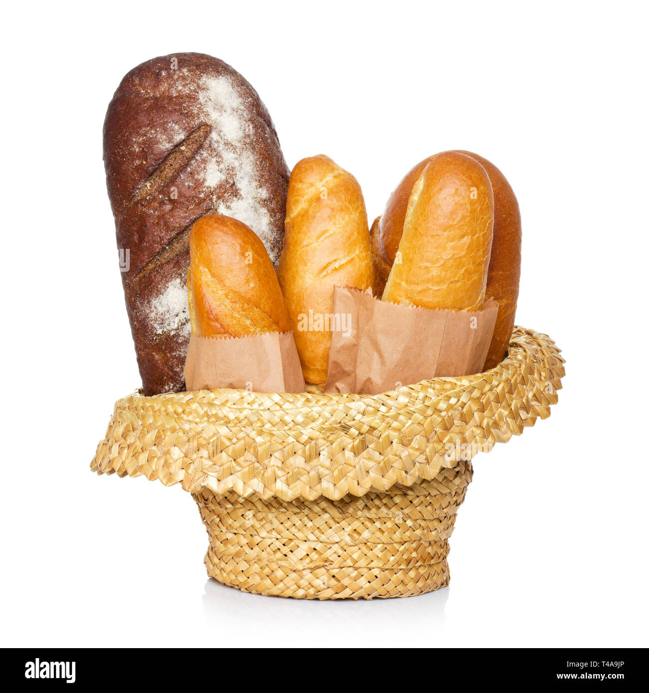 Bread in straw basket Cut Out Stock Images & Pictures - Alamy