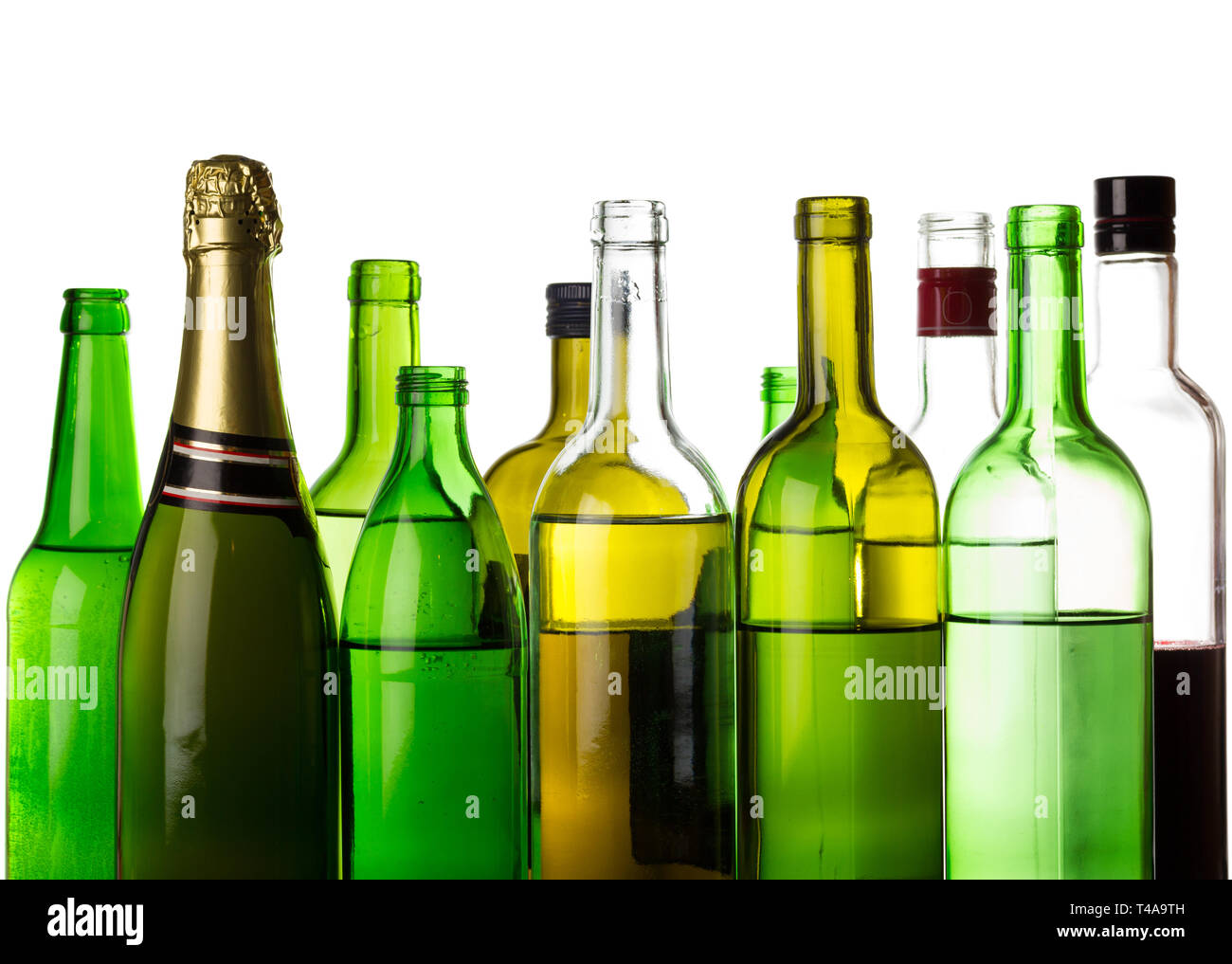 Different alcohol drinks bottles isolated on white Stock Photo - Alamy