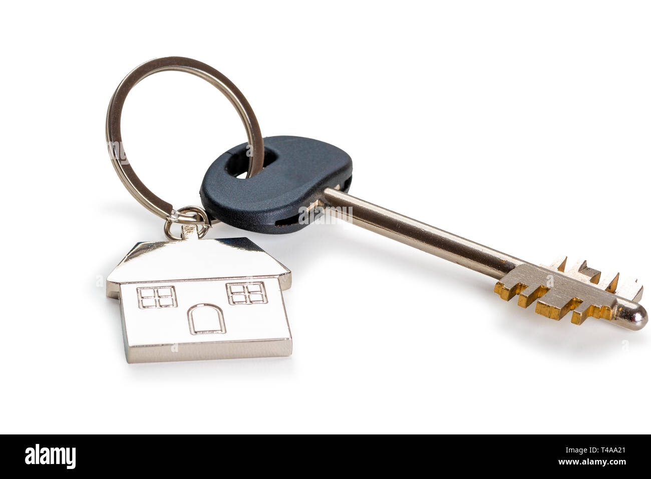 key with a key fob in the form of a house on a white background is ...