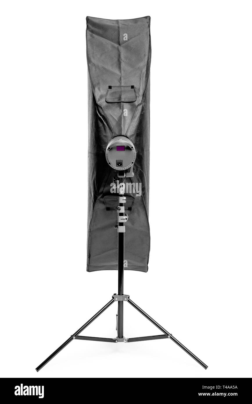 studio flash with a rectangular soft box on the rack on a white ...